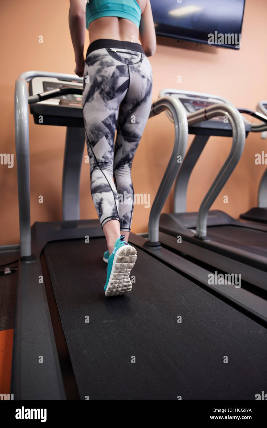 Female muscular legs on treadmill hi-res stock photography and images ...