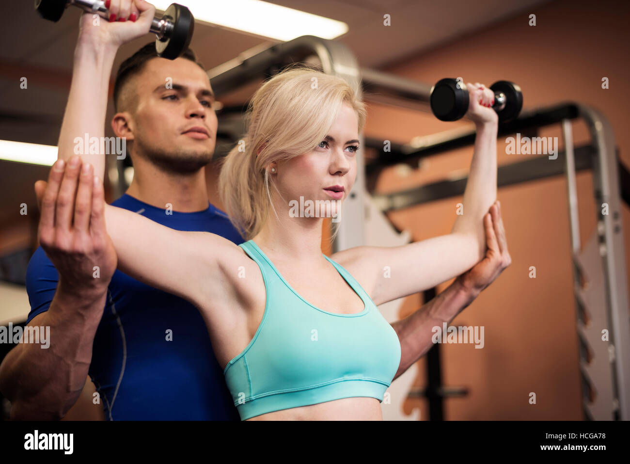 Hard work at woman's shoulder Stock Photo - Alamy
