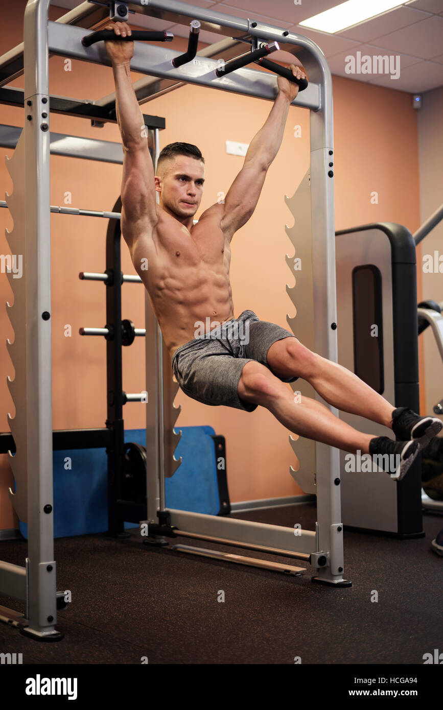 Strong enough to pull up on gym frame Stock Photo - Alamy