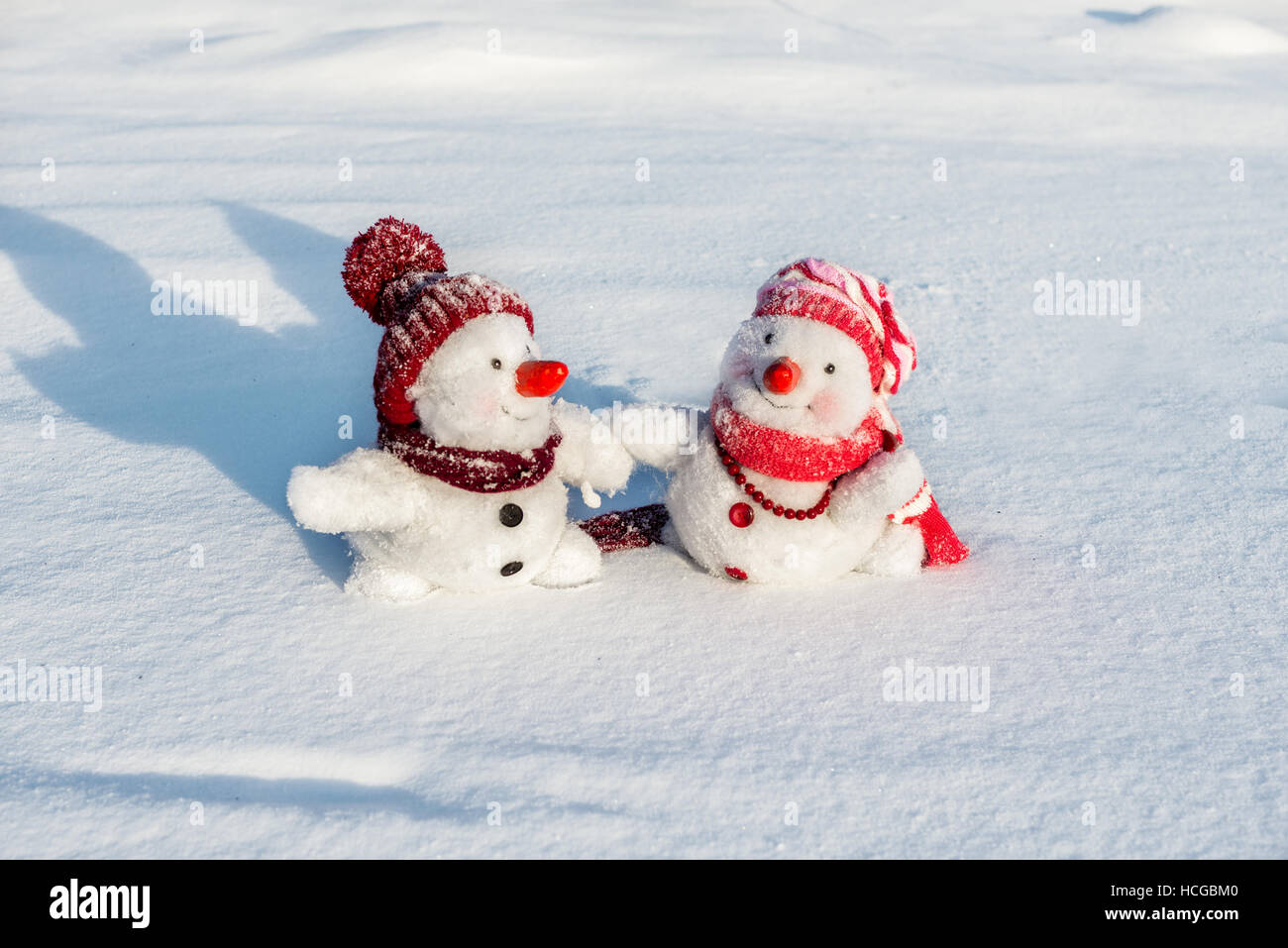 Couple of snowmen Stock Photo - Alamy