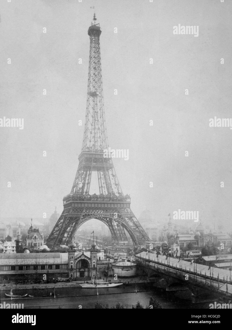 View of the Eiffel Tower with the pavilions of the Universal Exhibition ...