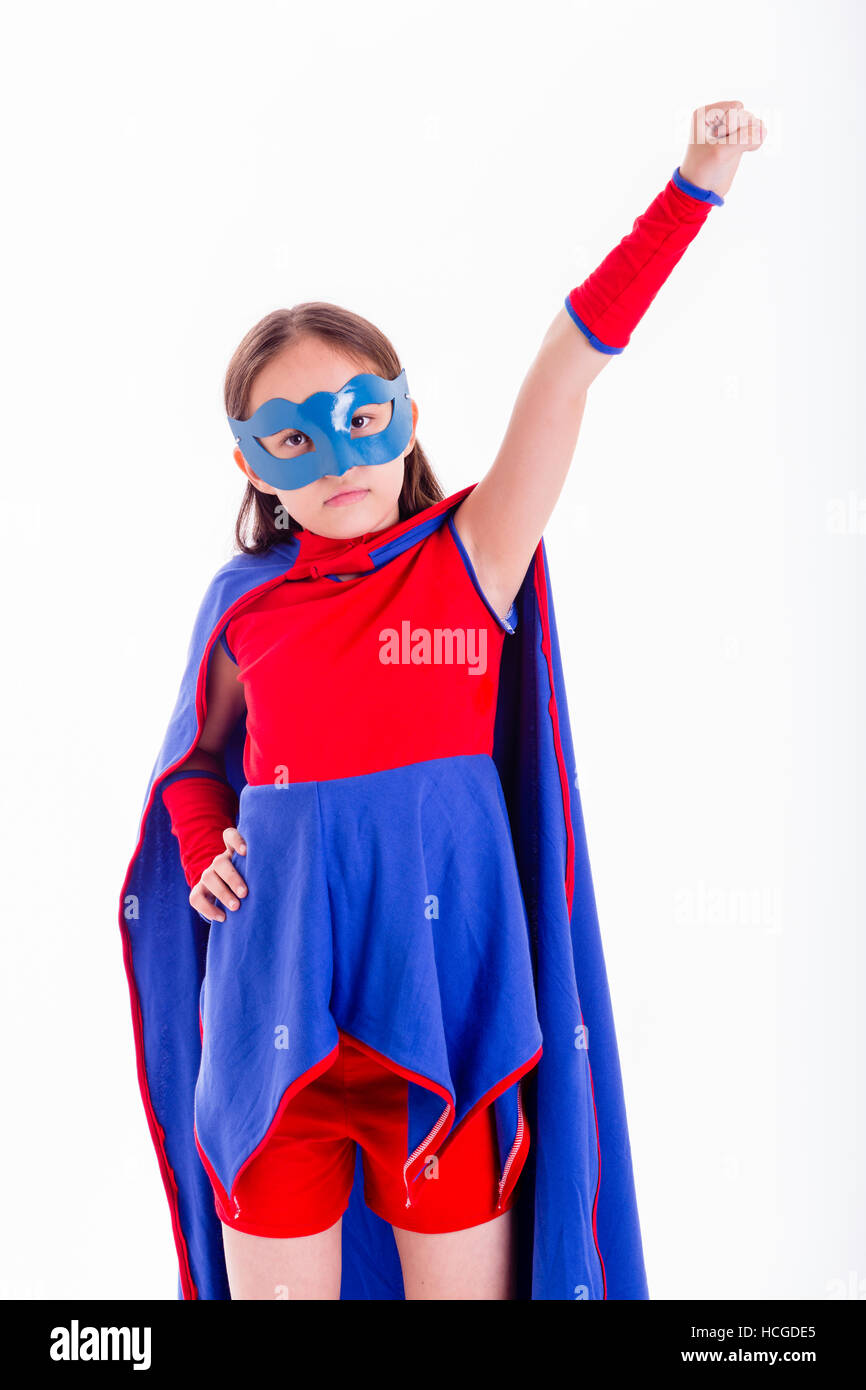 Girl in blue and red superhero costume with hand stretched out to fly ...