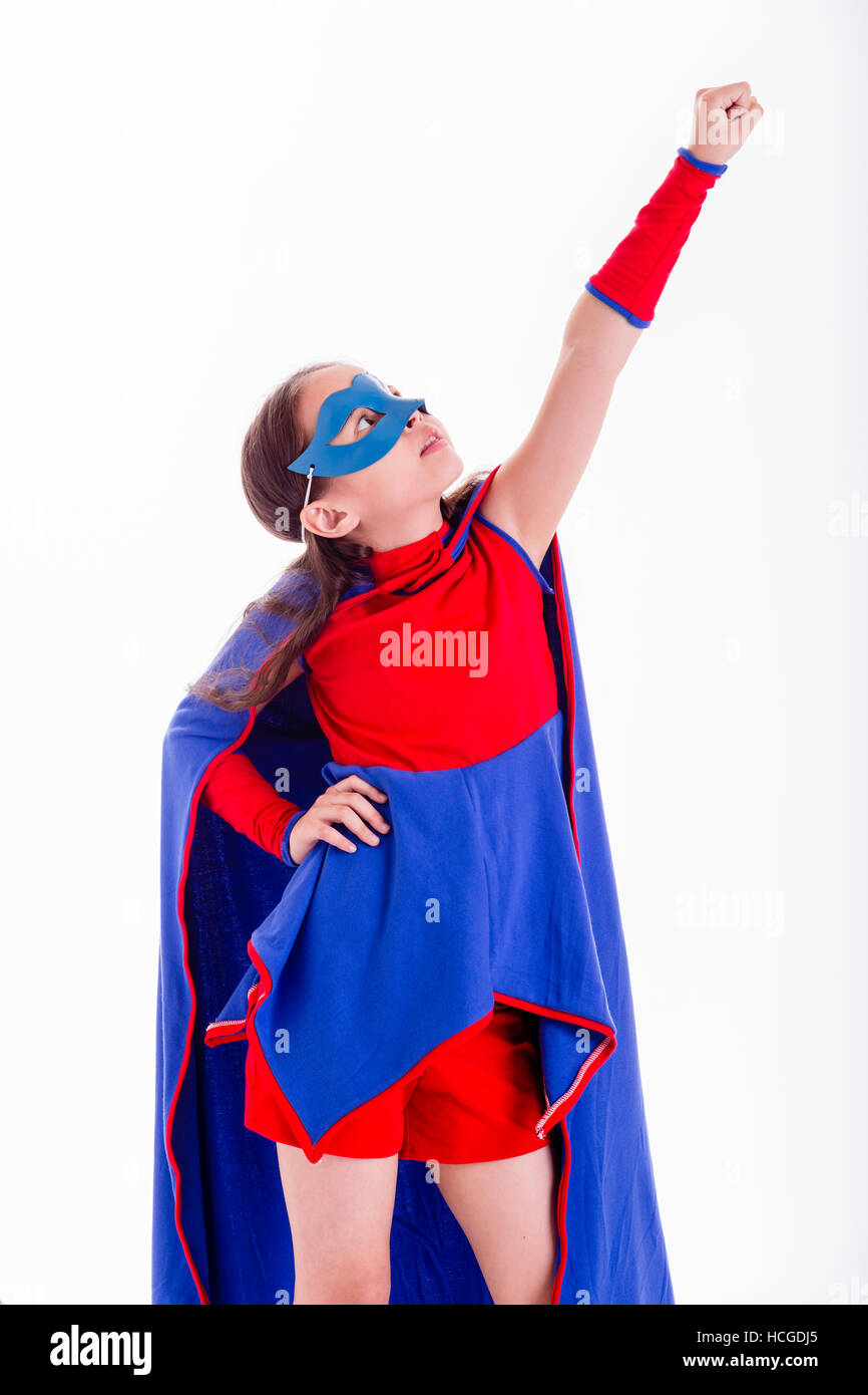 Girl in blue and red superhero costume with hand stretched out to fly ...