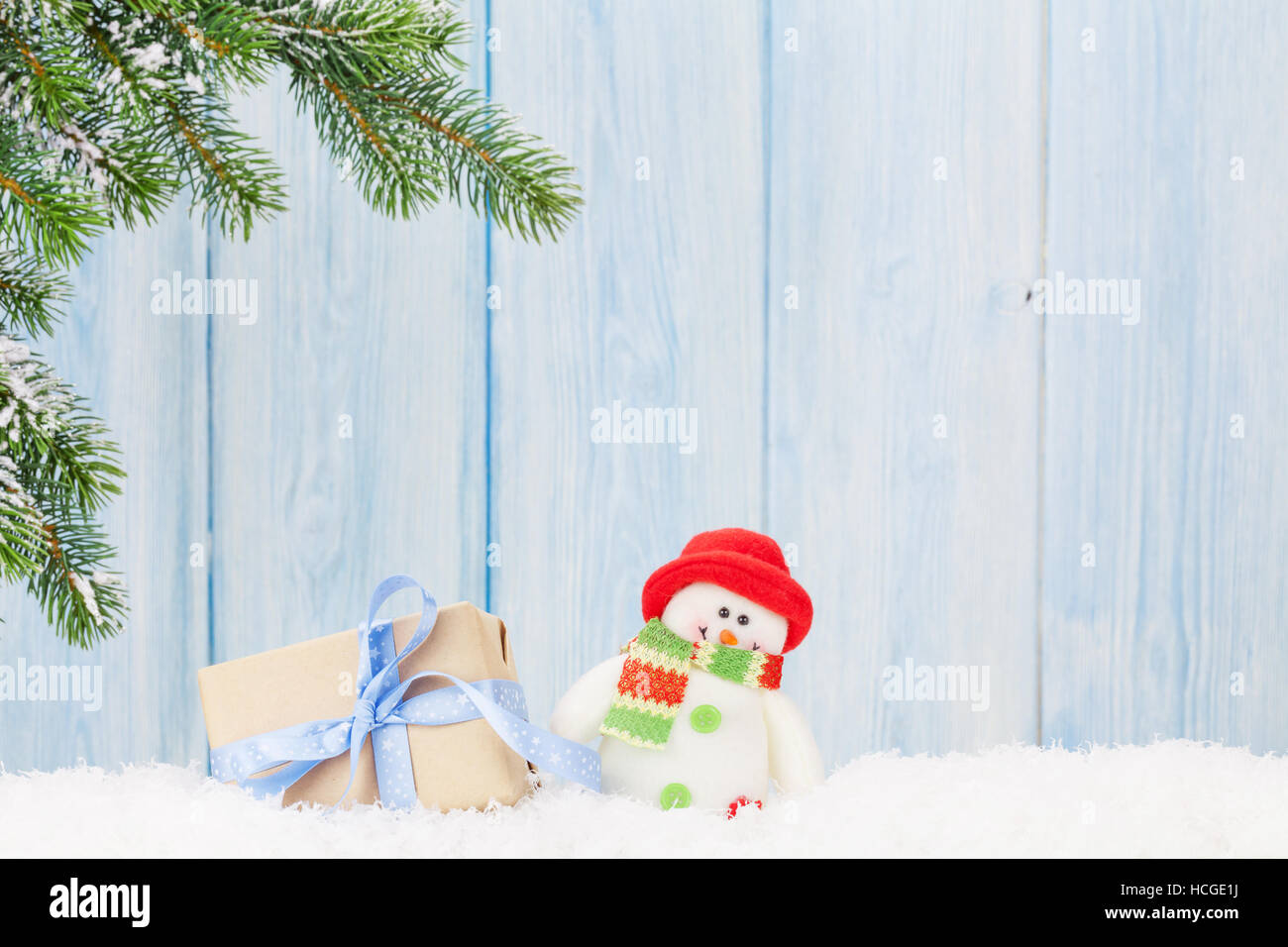 Snowman toy and fir tree branc hi-res stock photography and images - Alamy