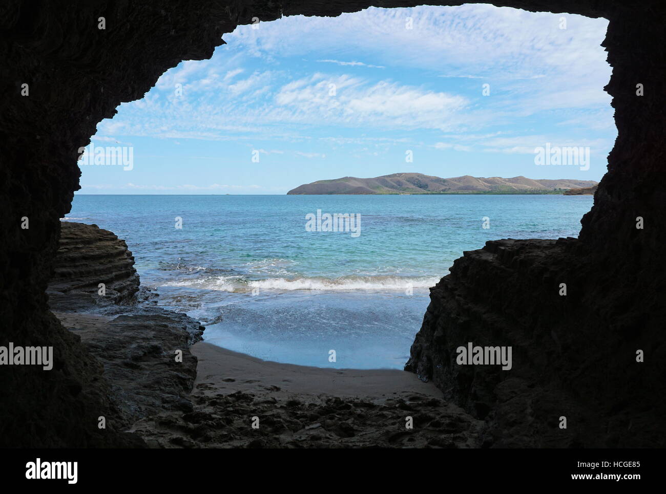 Exit of a tunnel in the rock on the sea shore connecting beaches of La ...
