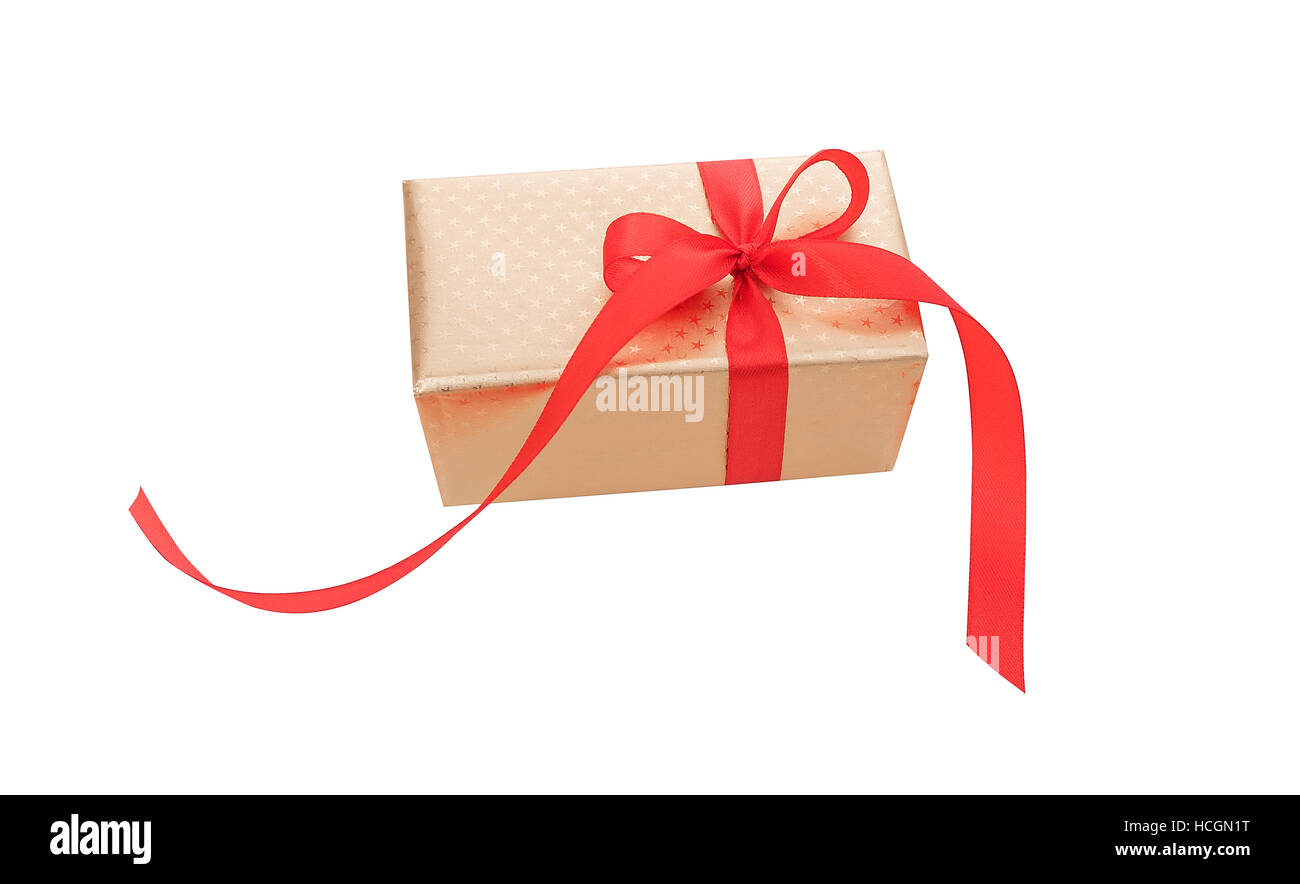 Gold box with red ribbon Stock Photo - Alamy