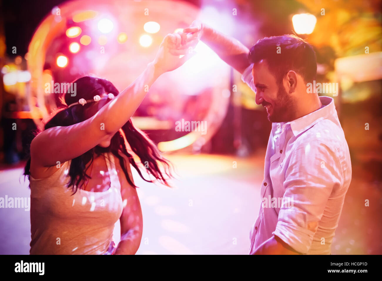 Young people dancing in disco hi-res stock photography and images - Alamy