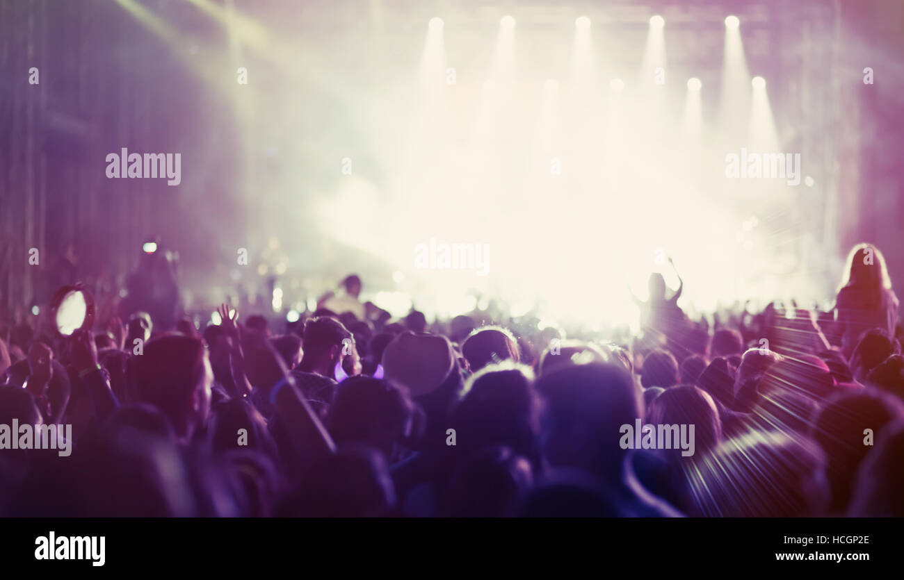 People dancing and cheering at music festival Stock Photo - Alamy