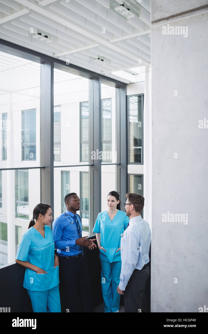 Doctors and nurse interacting with each other Stock Photo - Alamy