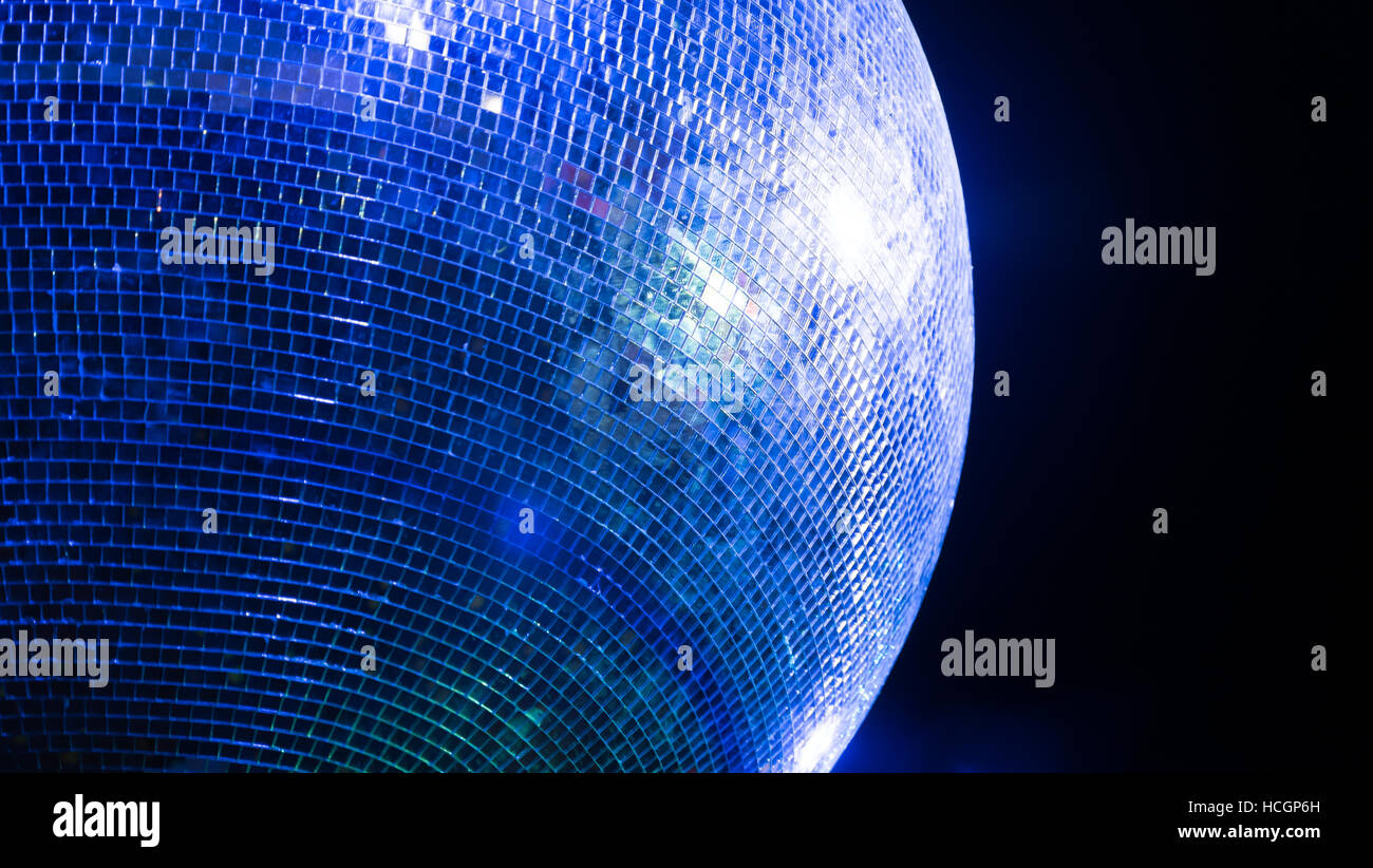 Glowing blue disco ball at club Stock Photo - Alamy
