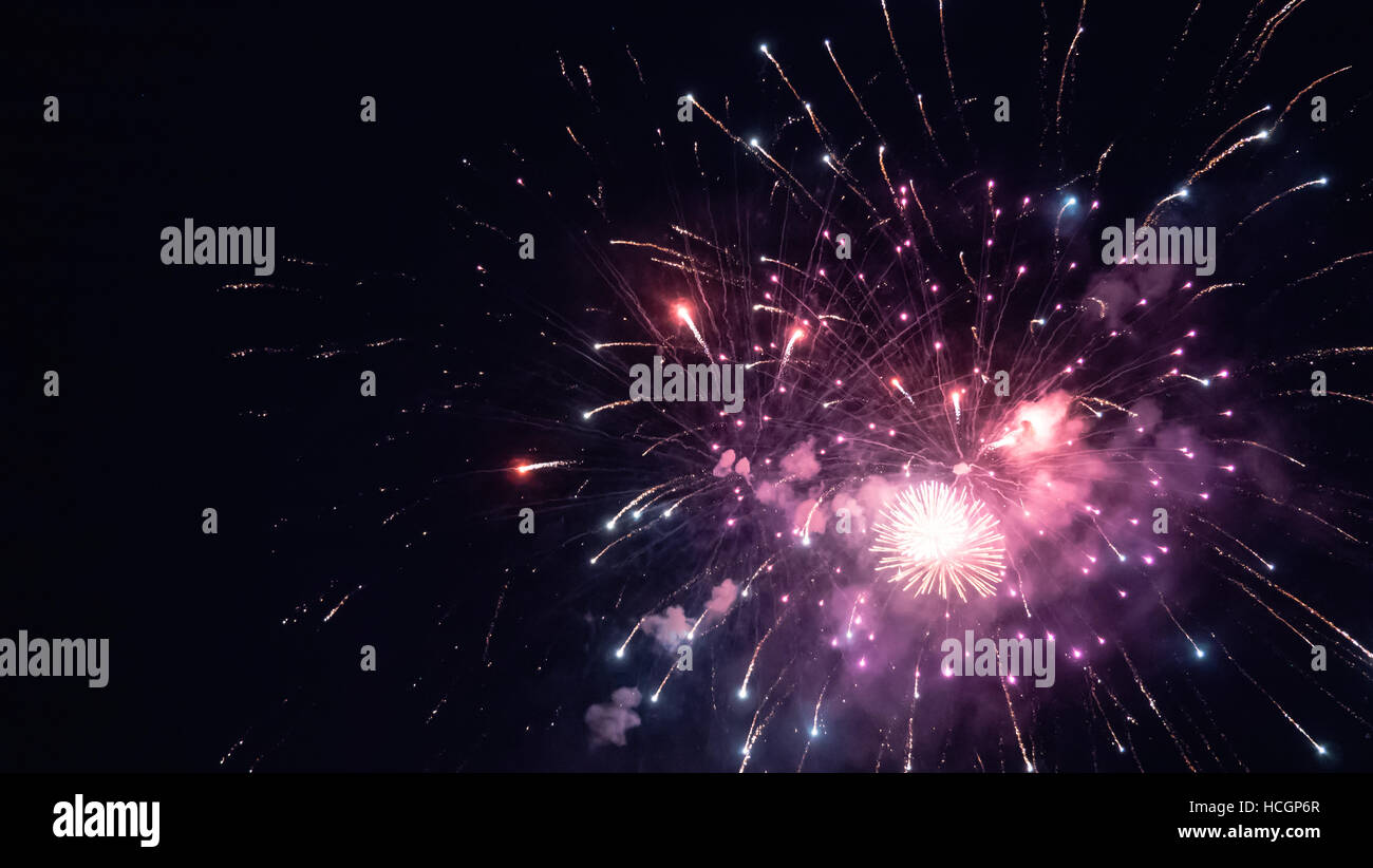 Beautiful real fireworks during celebration Stock Photo - Alamy