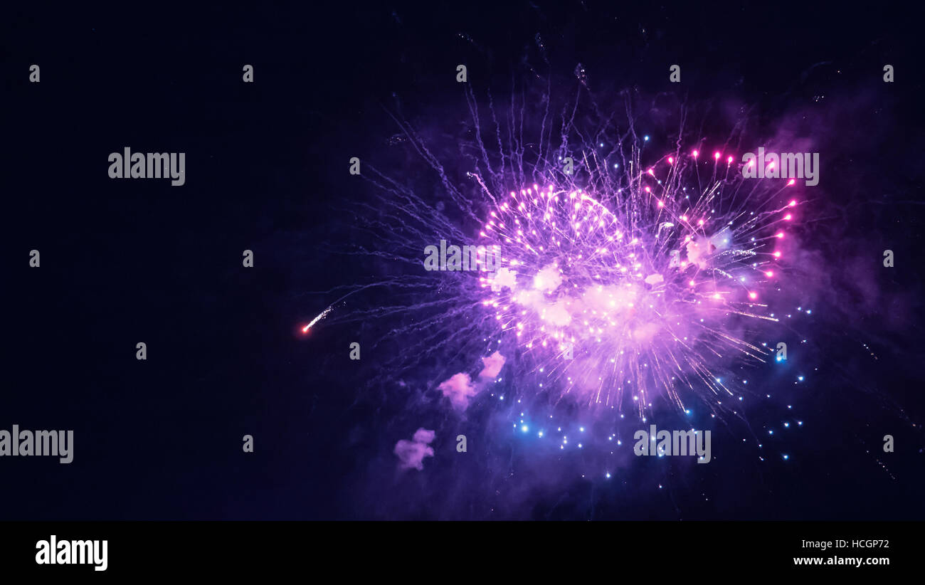 Beautiful real fireworks during celebration Stock Photo - Alamy