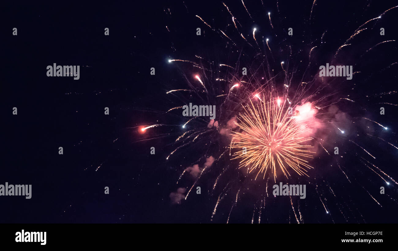 Beautiful real fireworks during celebration Stock Photo - Alamy