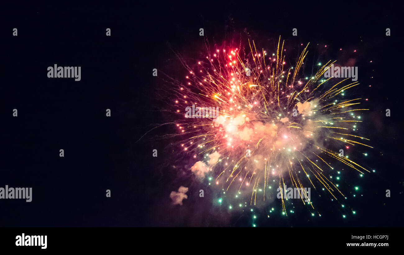 Beautiful real fireworks during celebration Stock Photo - Alamy