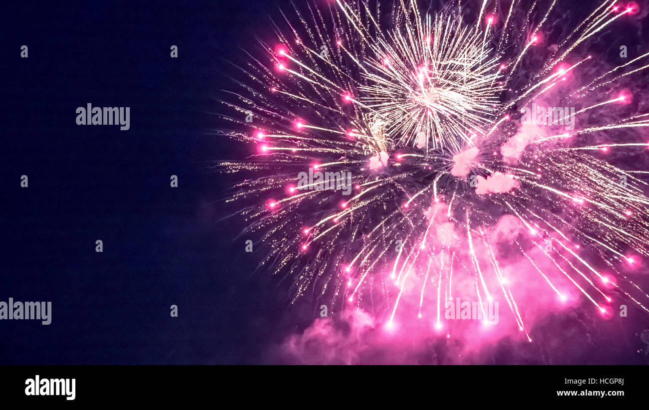 Beautiful real fireworks during celebration Stock Photo - Alamy