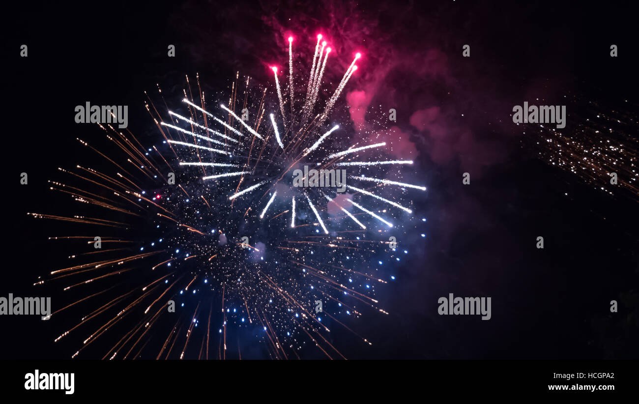 Beautiful real fireworks during celebration Stock Photo - Alamy