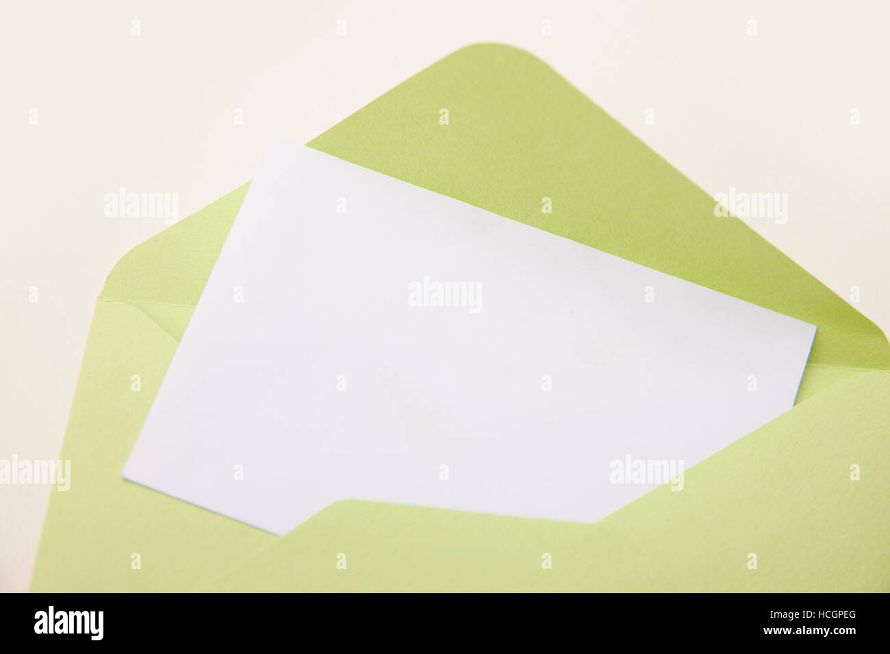 Paper in an envelope Stock Photo - Alamy