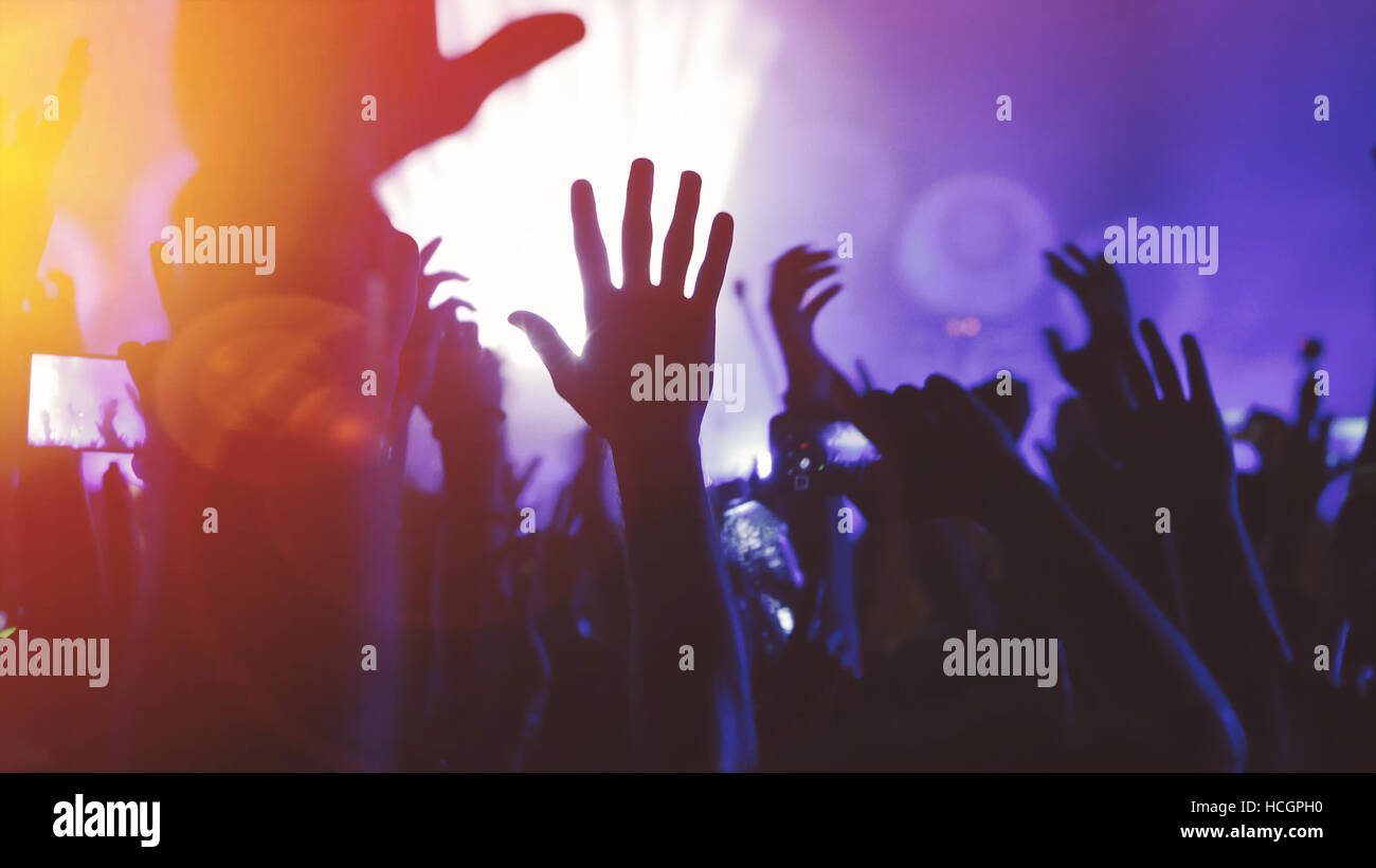 People dancing at concert and partying at festival Stock Photo - Alamy