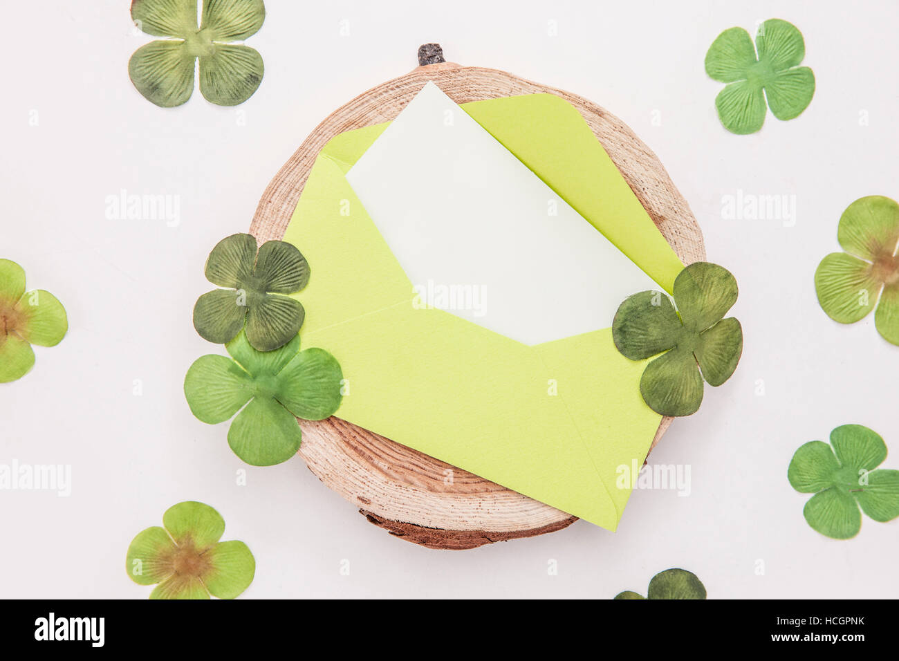 Letter with four-leaf clovers Stock Photo - Alamy