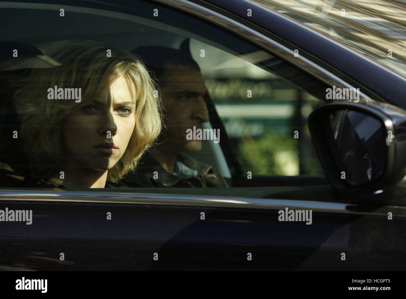 LUCY, from left: Scarlett Johansson, Amr Waked, 2014. ph: Jessica Forde ...