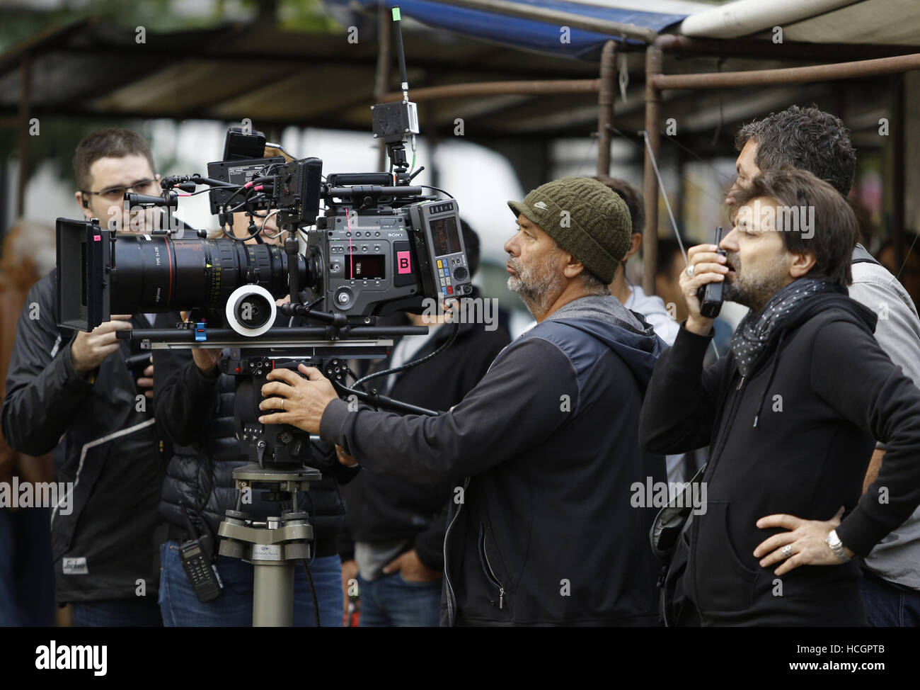 LUCY, director Luc Besson (center), on set, 2014. ph: Jessica Forde ...