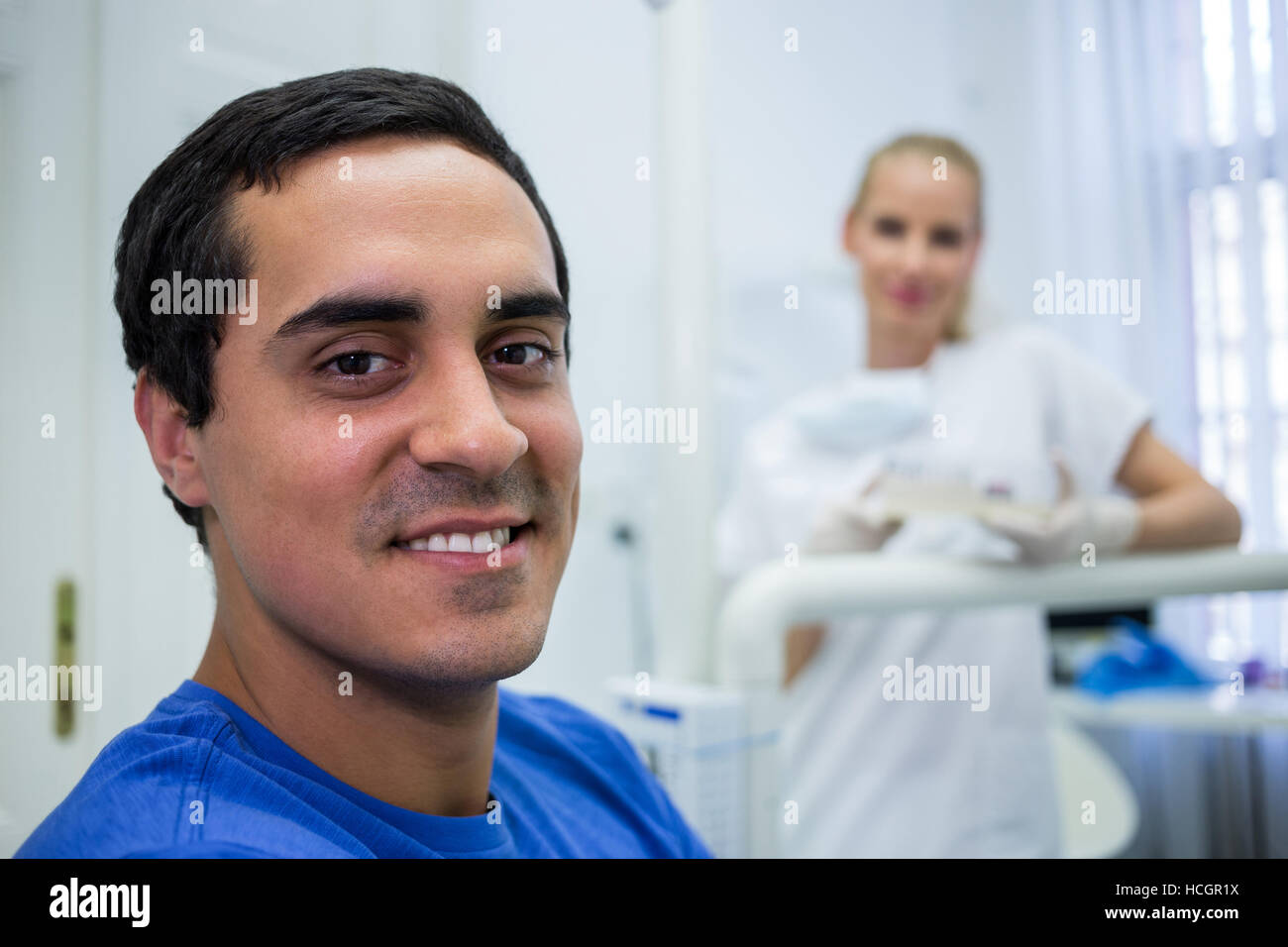 Smiling patient at clinic Stock Photo - Alamy
