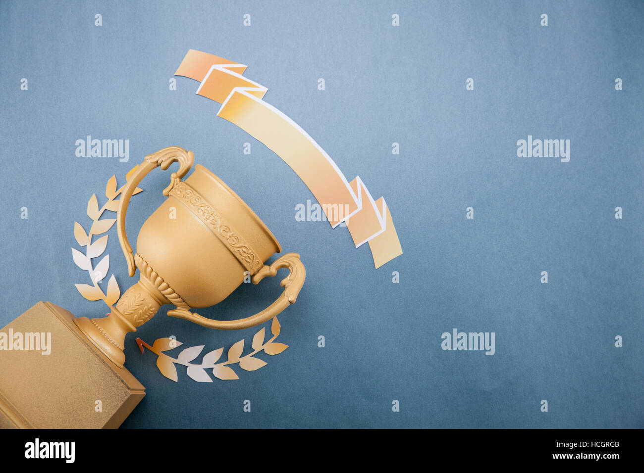 Golden trophy with ribbon Stock Photo - Alamy
