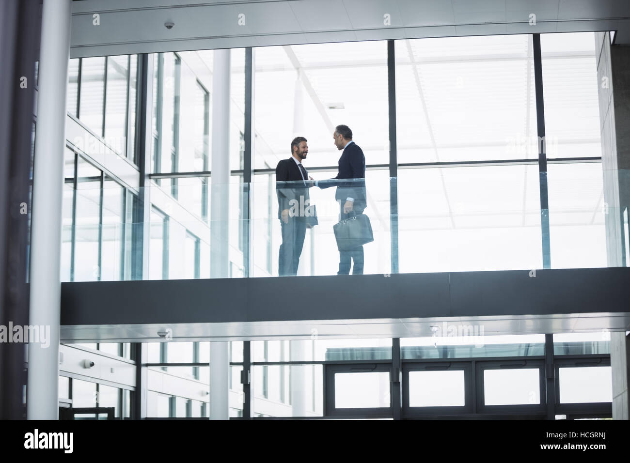 Greeting colleagues hi-res stock photography and images - Alamy