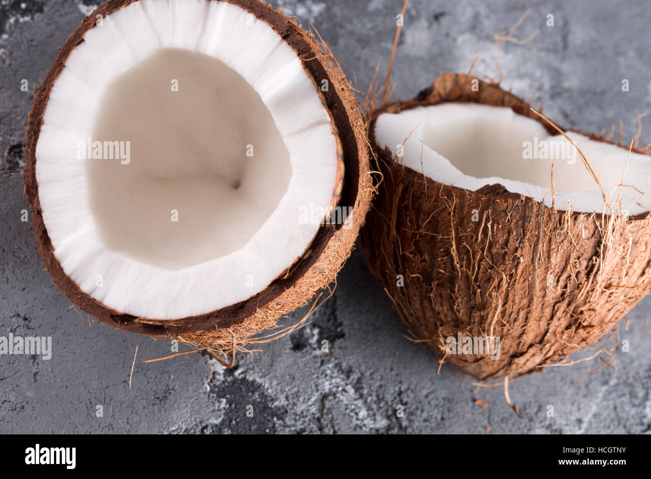 coconuts on the grey stone background Stock Photo - Alamy
