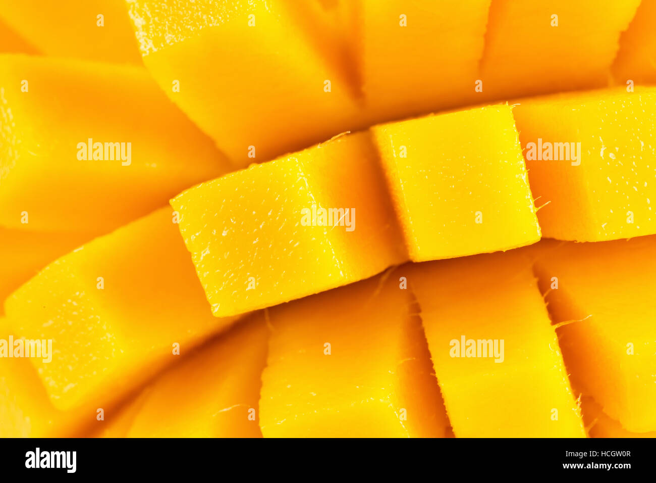 mango cube slices isolated on the white background Stock Photo - Alamy
