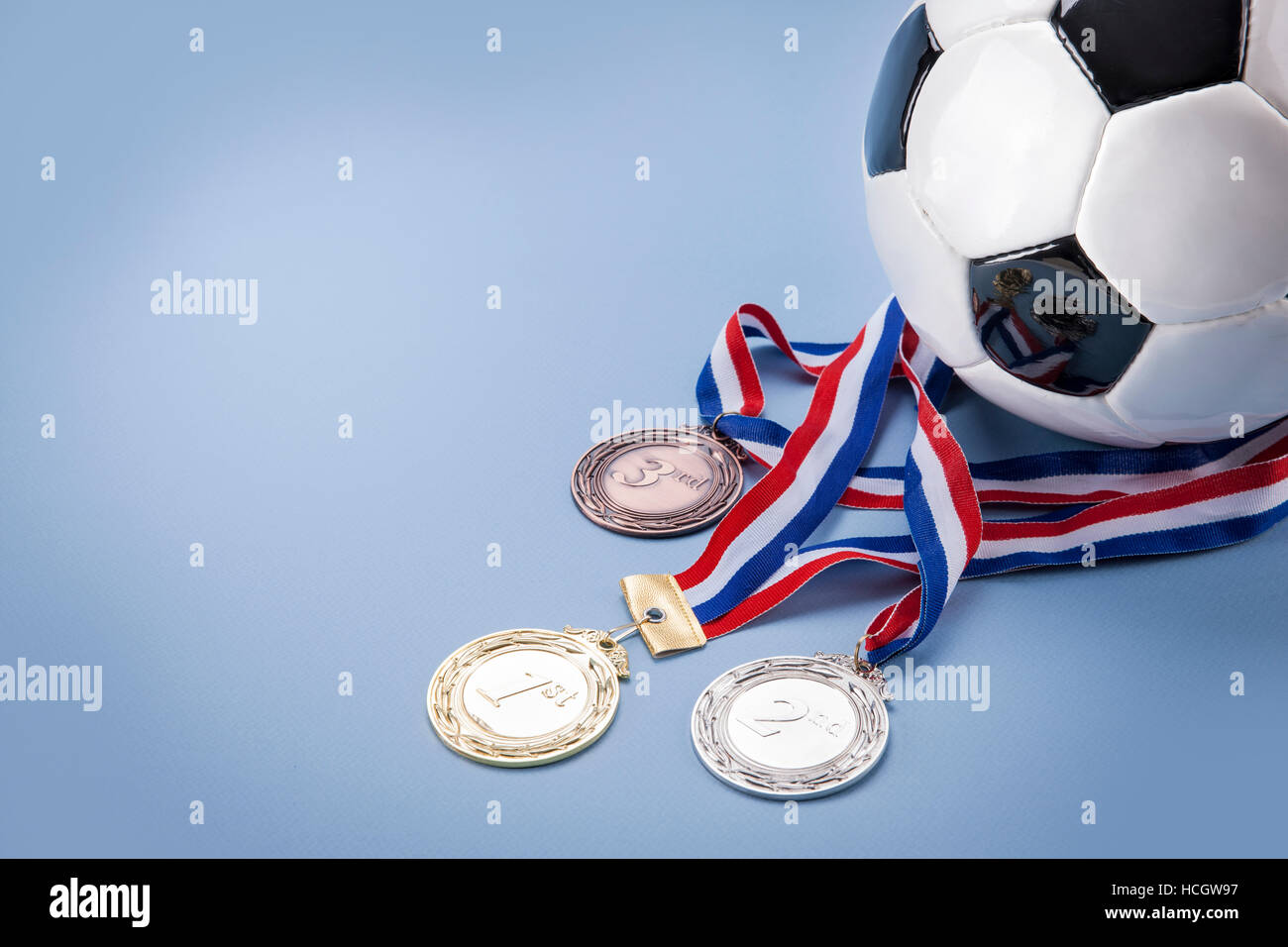 Soccer ball and medals Stock Photo - Alamy