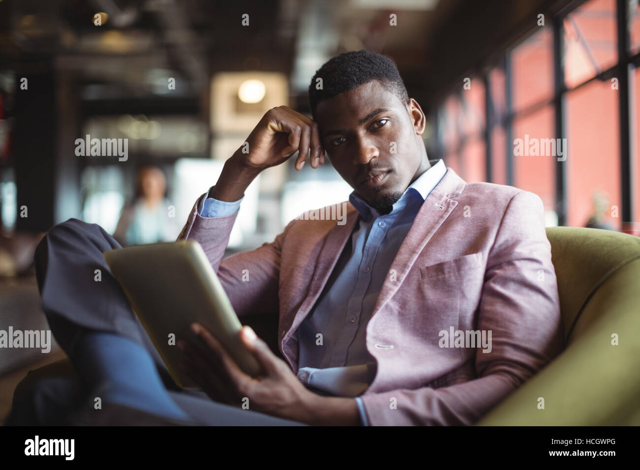 Businessman holding digital tablet Stock Photo - Alamy