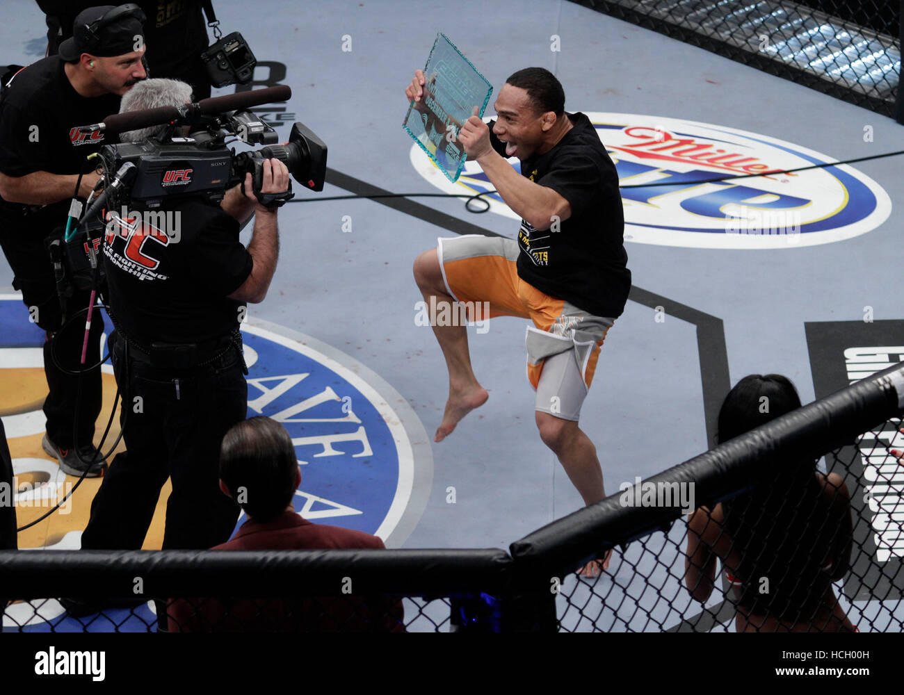 John Dodson celebrates his win over T.J. Dillashaw at The Ultimate ...