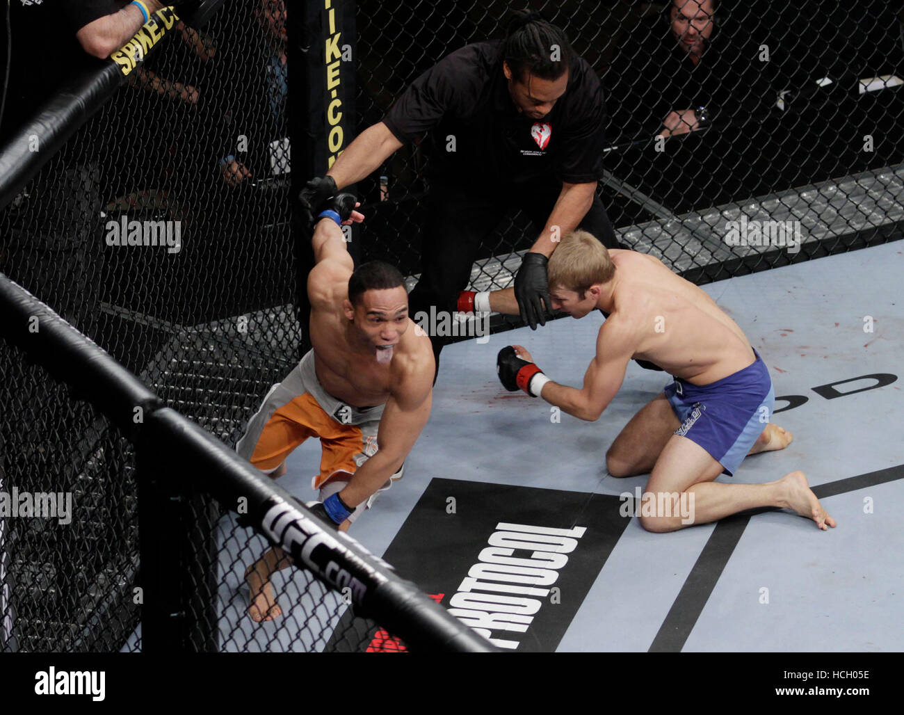 John Dodson, left, celebrates his win over T.J. Dillashaw at The ...