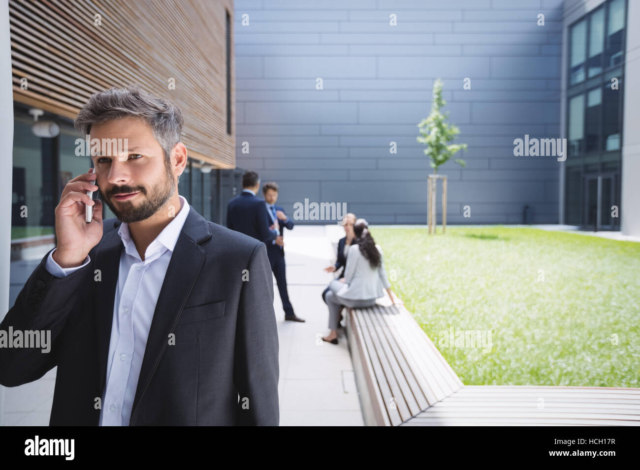 Successful male businessman using hi-res stock photography and images ...