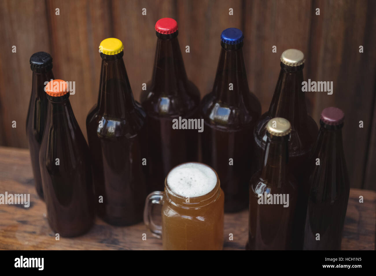 Homemade beer bottles and a mug of beer Stock Photo - Alamy