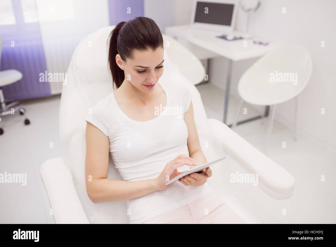 Beautiful women using digital tablet Stock Photo - Alamy