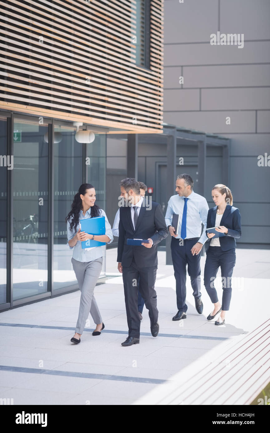 Business woman walking laptop hi-res stock photography and images - Alamy