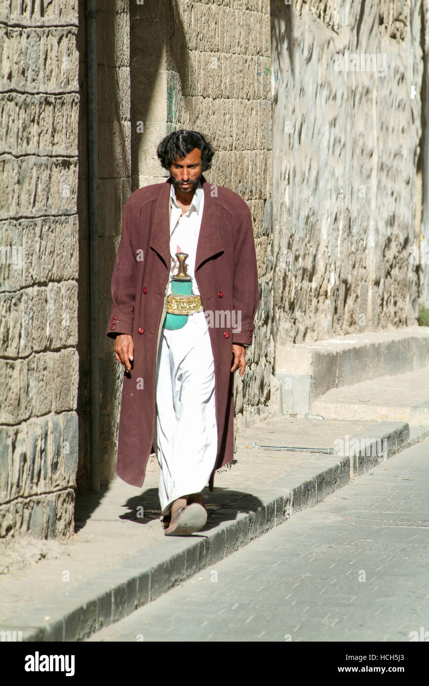 Sana, Yemen - 3 January 2008: man with traditional clothes walking on ...