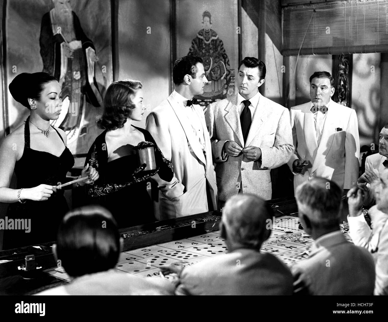 MACAO, Gloria Grahame (second from left), Brad Dexter, Robert Mitchum ...