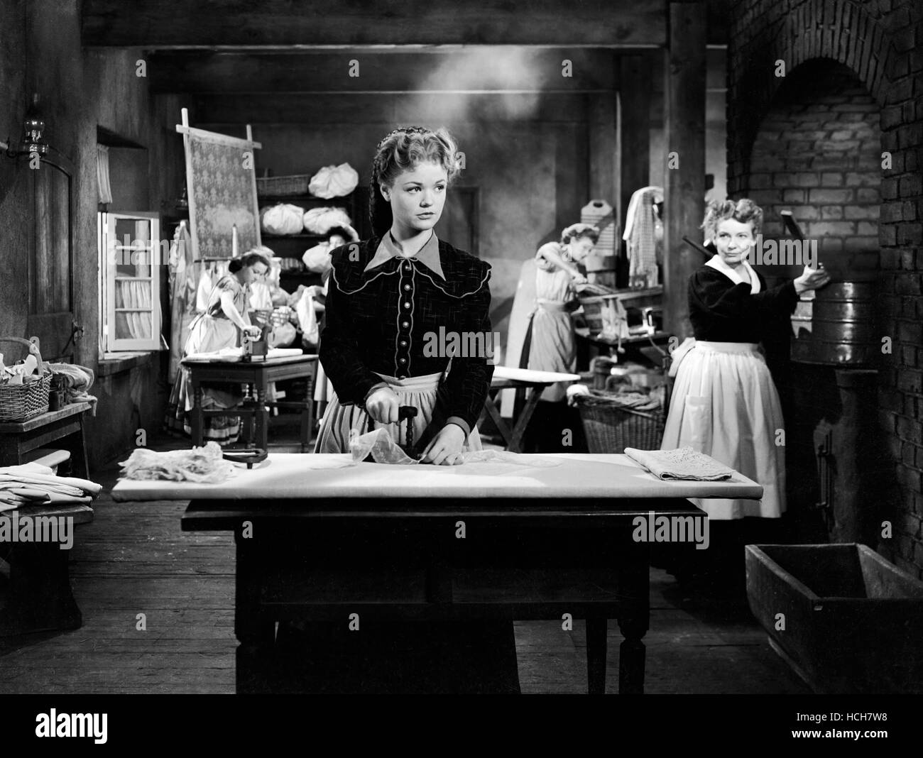 MADEMOISELLE FIFI, Simon Simon (center), Lillian Bronson (right), 1944 Stock Photo - Alamy