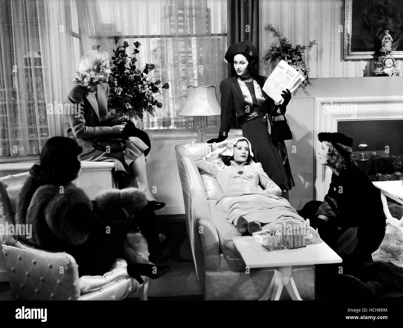 THE MAD MISS MANTON, Vicki Lester (top left), Barbara Stanwyck (on sofa ...
