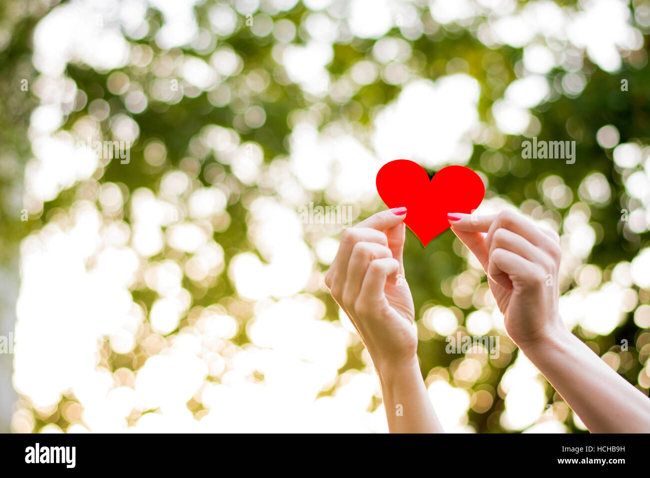 Hands raised crowd women hi-res stock photography and images - Alamy