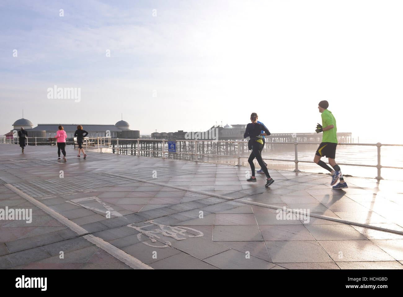 Running in front of pier hi-res stock photography and images - Alamy