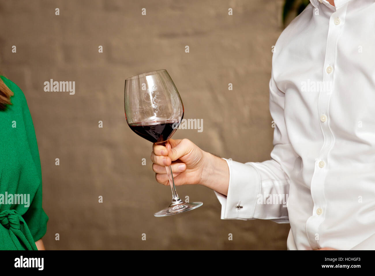 Man hand with wine glass Stock Photo - Alamy