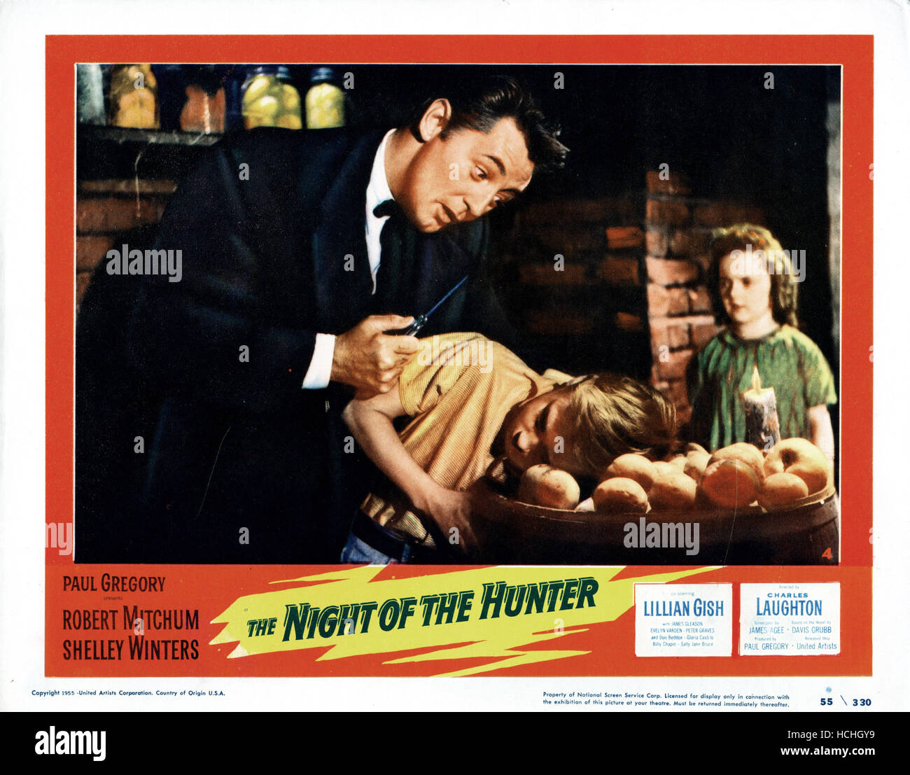 THE NIGHT OF THE HUNTER, Robert Mitchum, Billy Chapin, 1955 Stock Photo ...