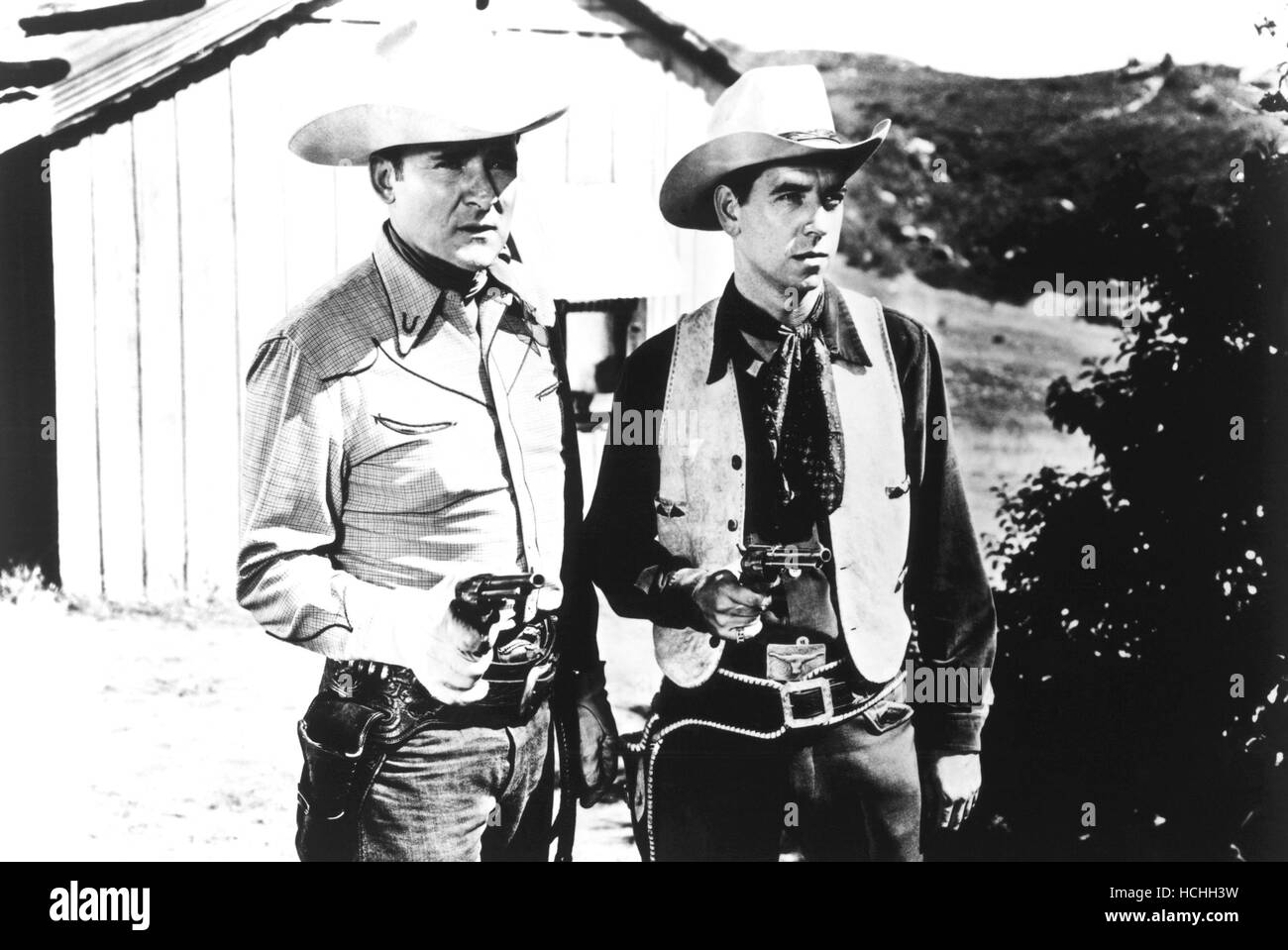 NIGHT RAIDERS, from left: Whip Wilson, Tommy Farrell, 1952 Stock Photo ...