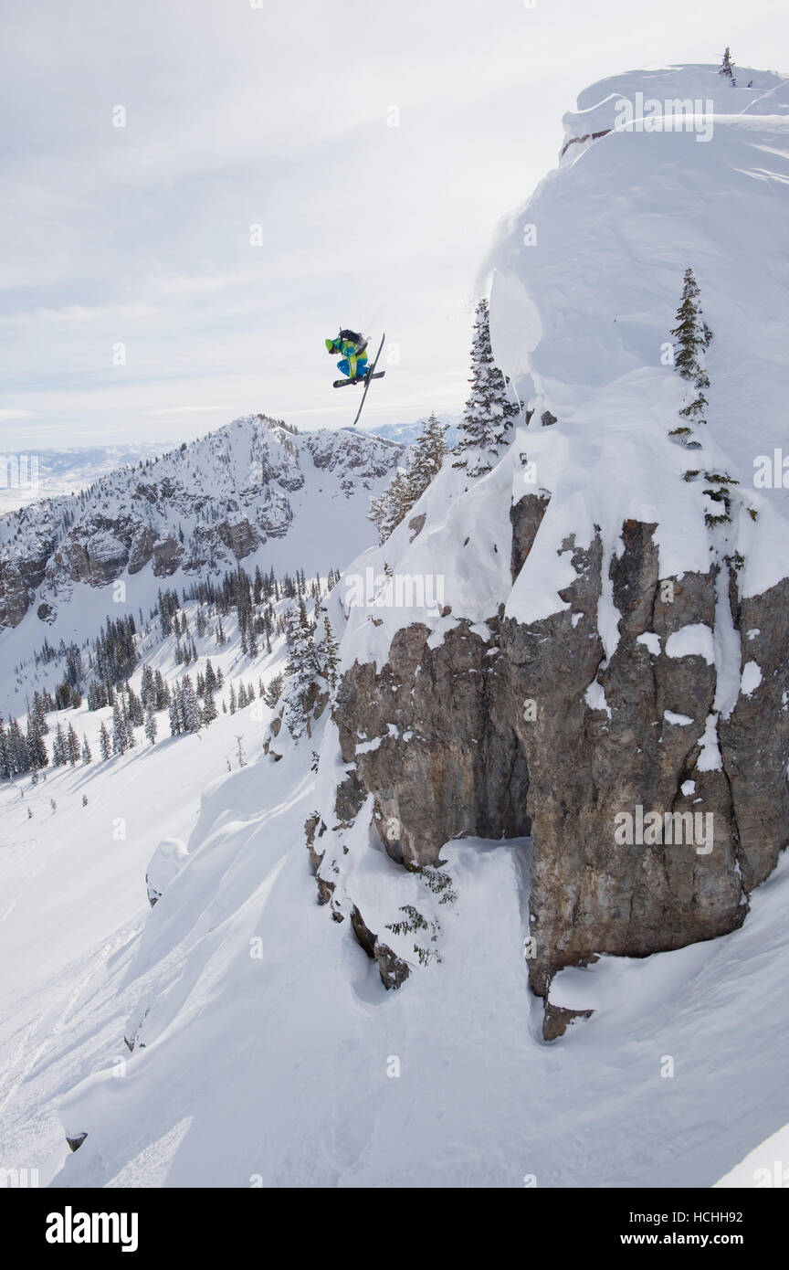 Jamie Pierre skiing off cliff jump, Alta, Utah Stock Photo - Alamy