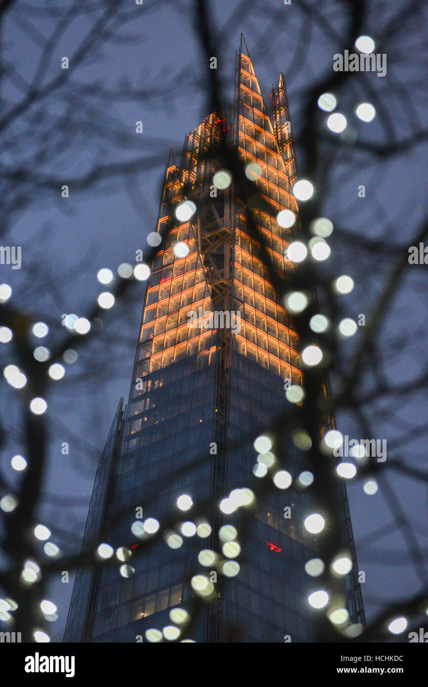 London, UK. 8th December 2016. The Shard seen through Christmas lights ...
