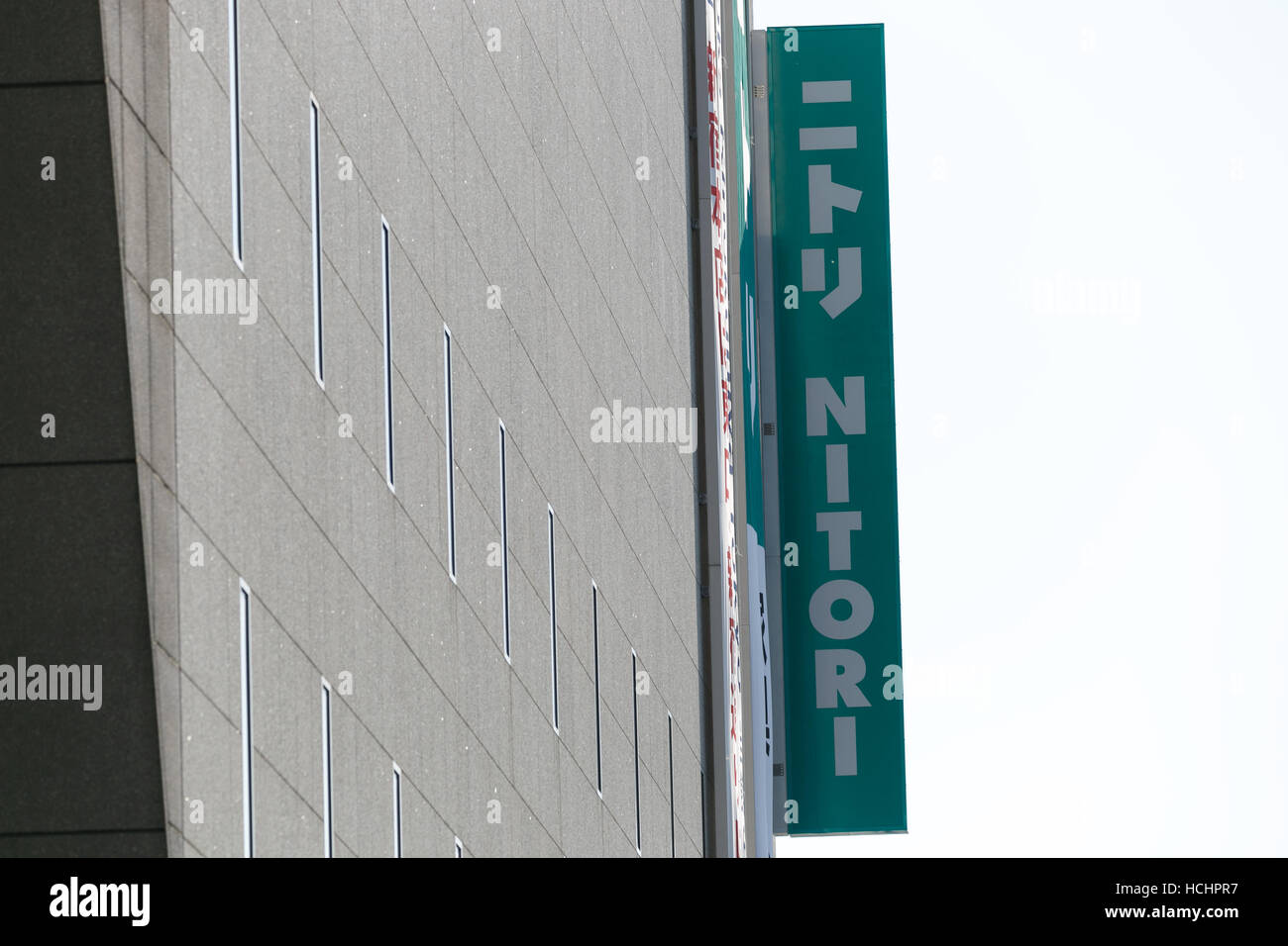 A Nitori signboard on display outside the new Nitori department store ...